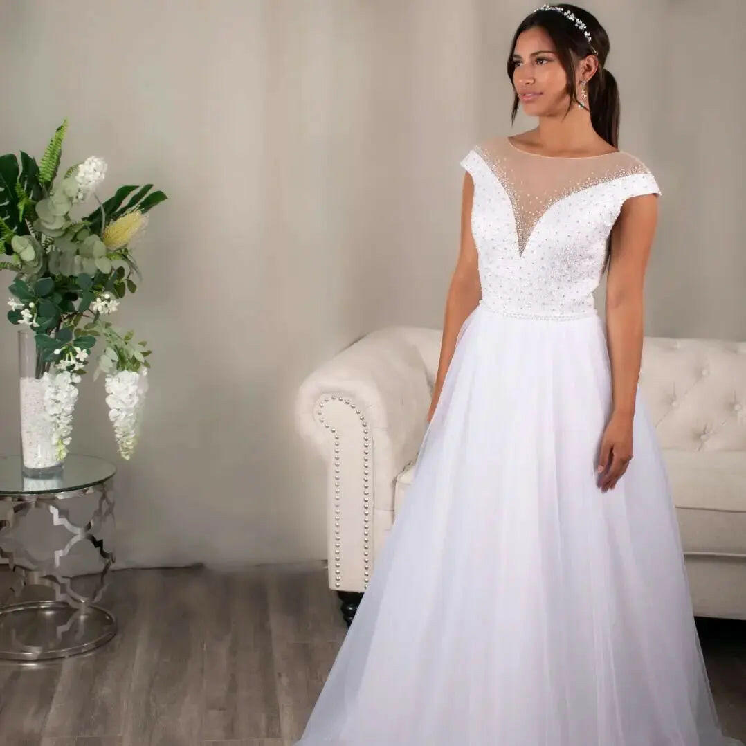 Deb Ball Dresses | Divine Bridal Beaded Elegance